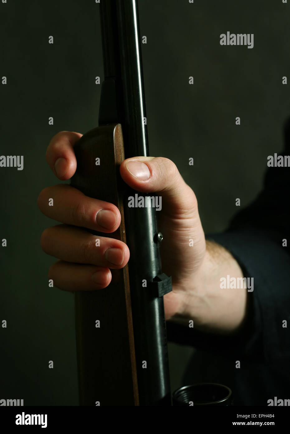 Gun in a hand Stock Photo - Alamy