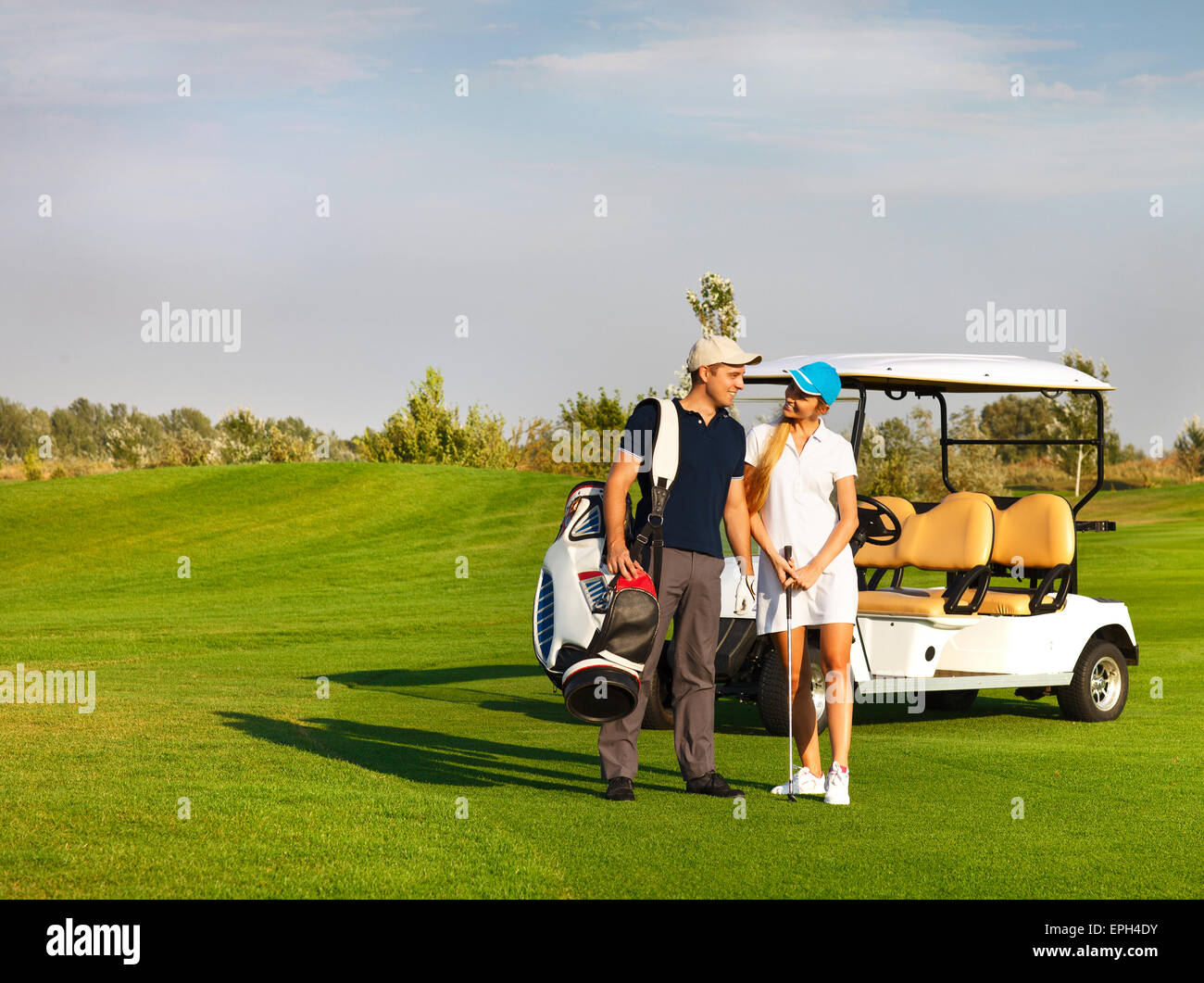 Two couple playing golf together hi-res stock photography and images ...