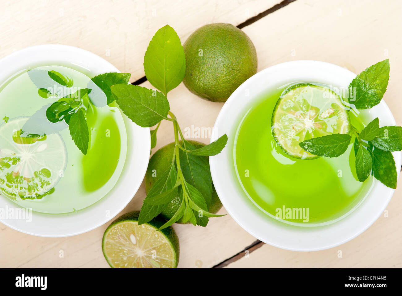 mint infusion tea tisane with lime Stock Photo - Alamy