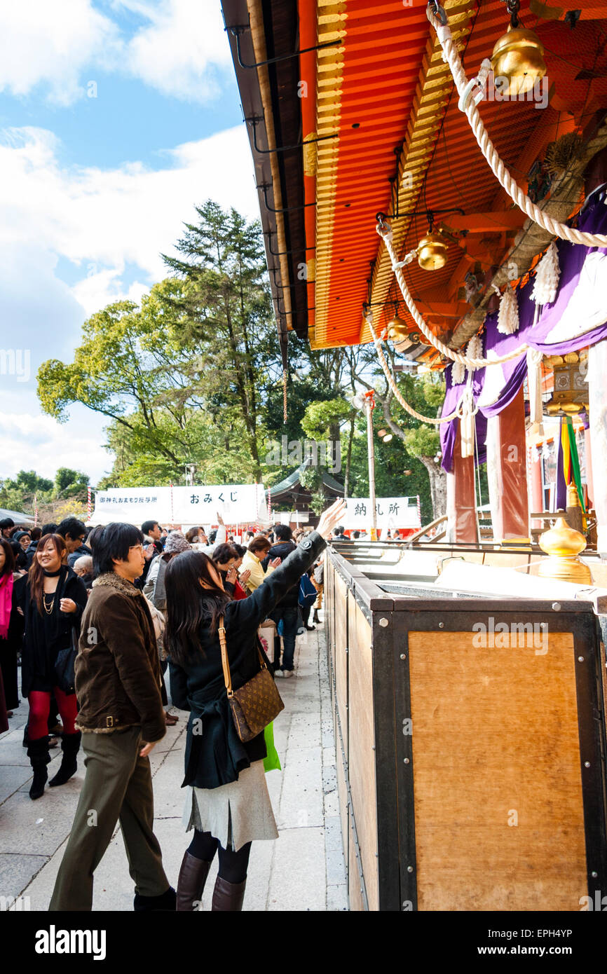 New year in Japan. Many people in front of the main stage of the hall ...