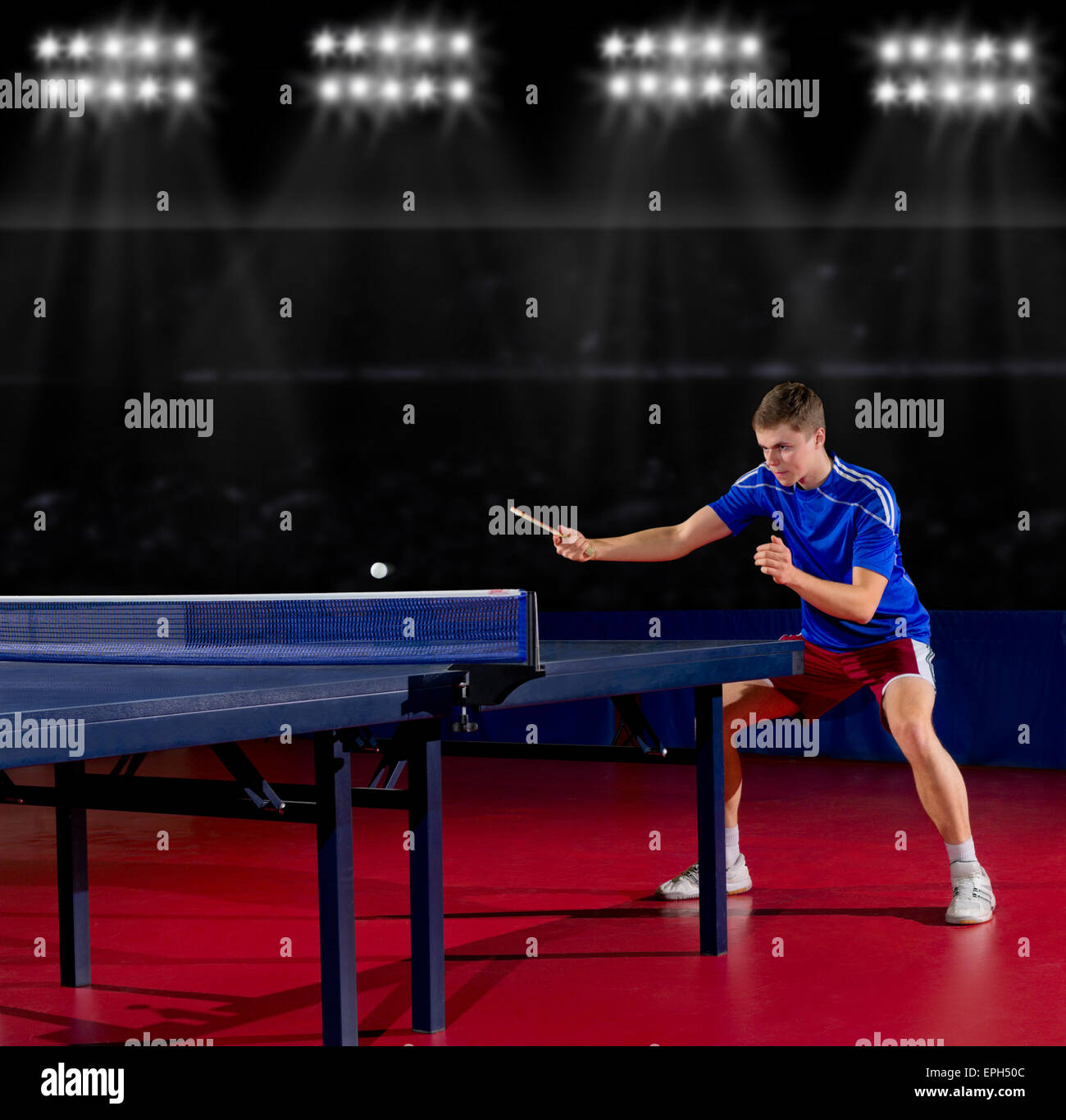 Young table tennis player at sports hall Stock Photo - Alamy