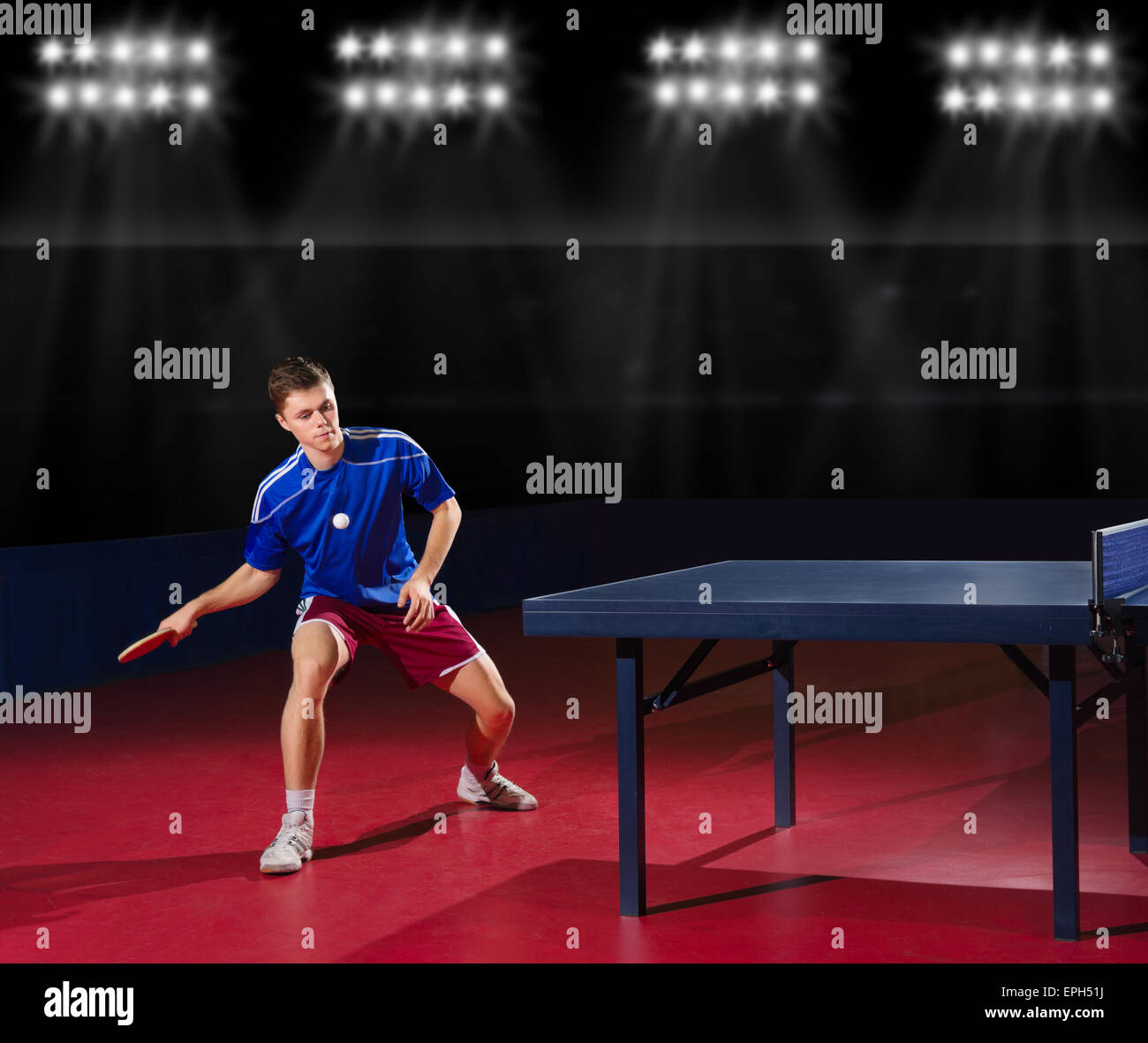 Young table tennis player at sports hall Stock Photo - Alamy