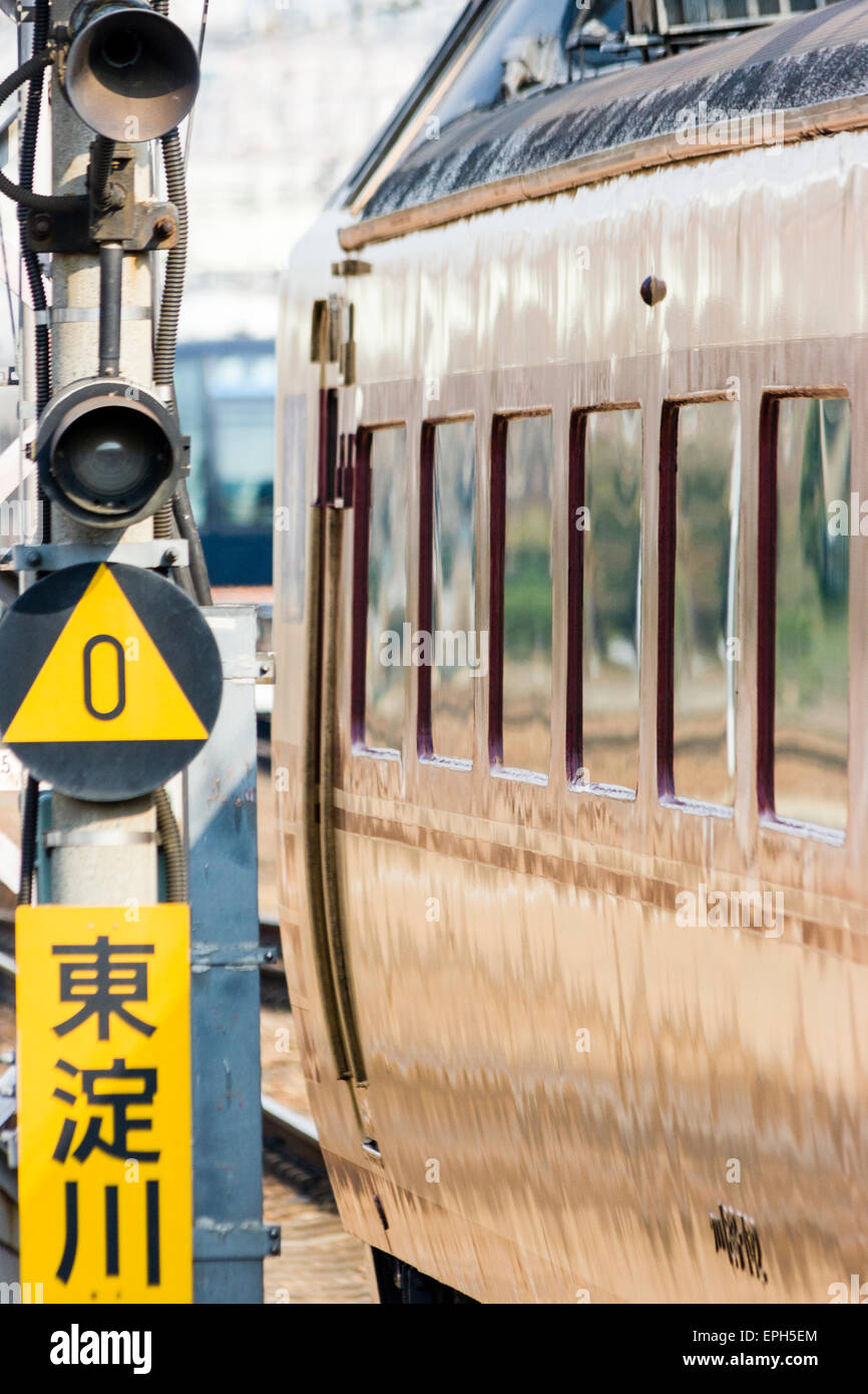 Japan. Japanese Railways, JR, Commuter train, passing by. Compressed ...
