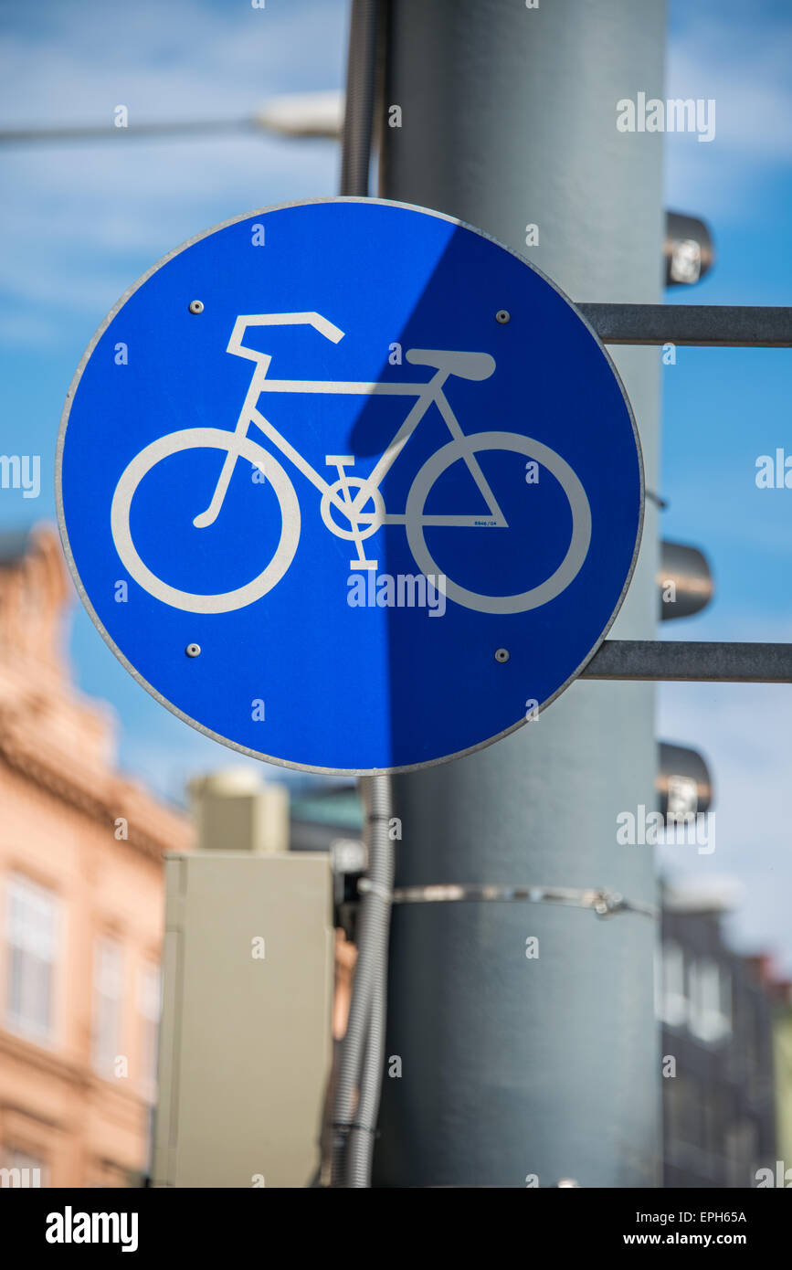 Bicycle sign on street post Stock Photo - Alamy