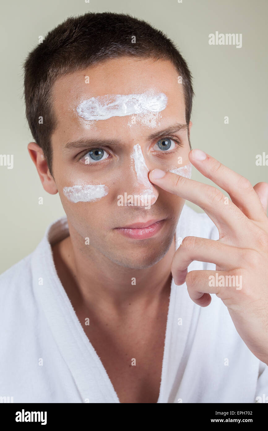 Man with cream in his face Stock Photo - Alamy