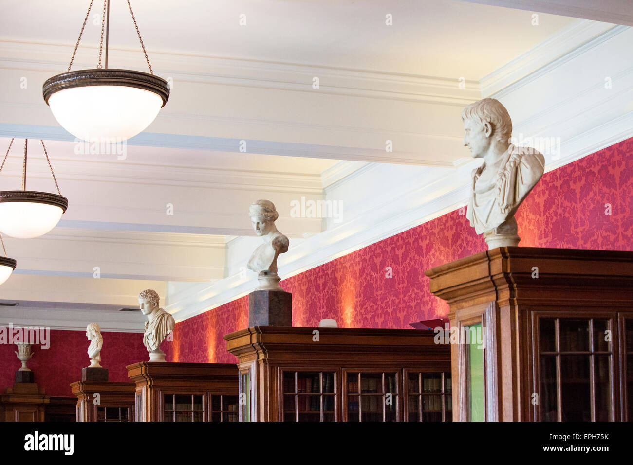 sculpture on top of a bookshelf Stock Photo - Alamy