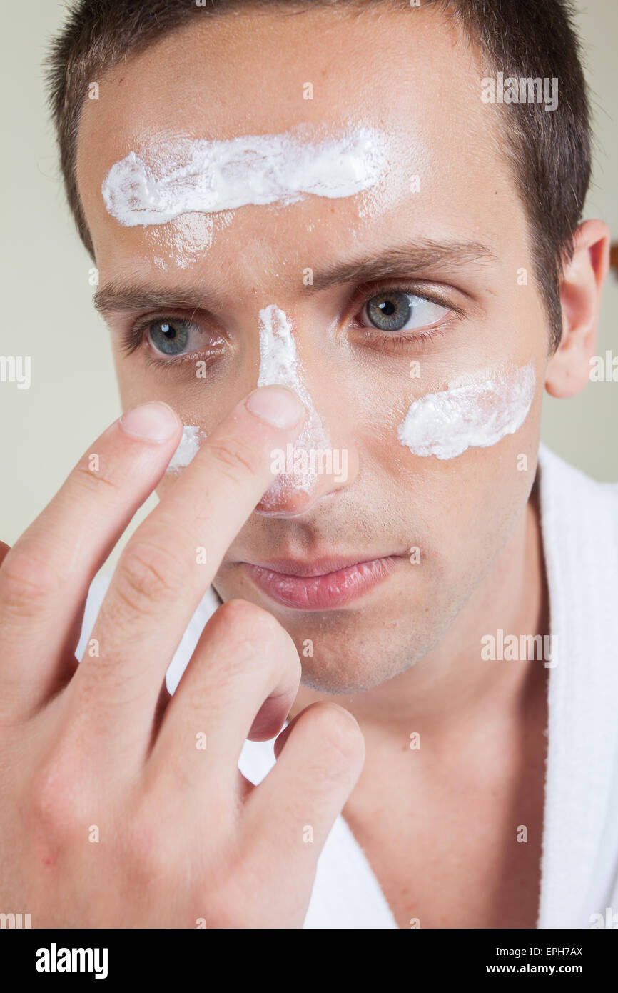 Man with cream in his face Stock Photo - Alamy