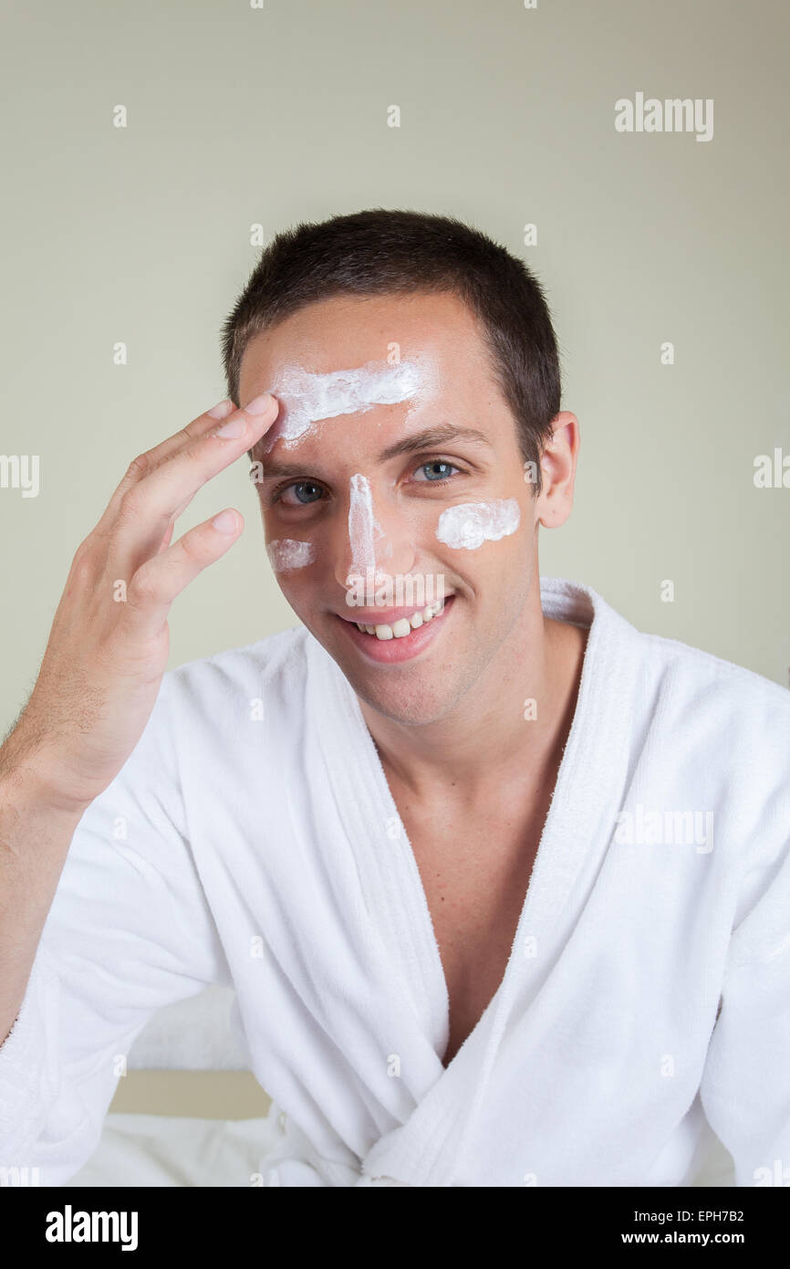 Man with cream in his face Stock Photo - Alamy