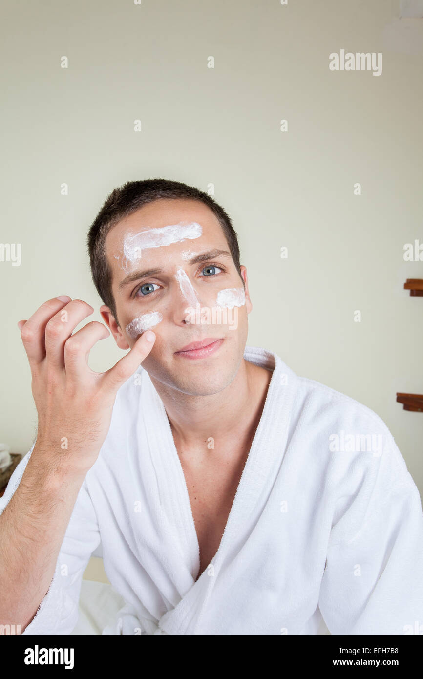 Man with cream in his face Stock Photo - Alamy