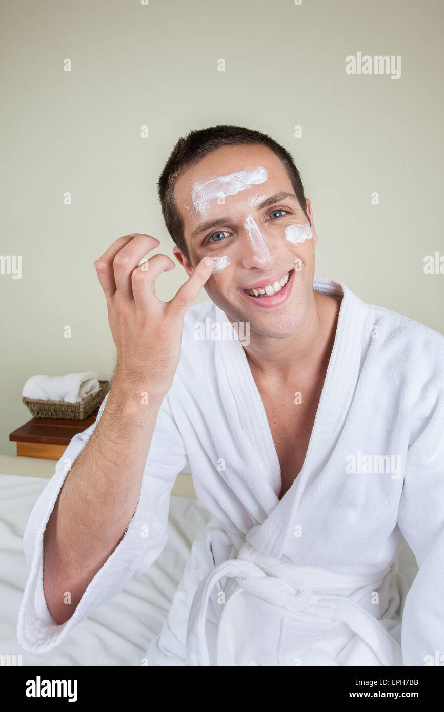 Man with cream in his face Stock Photo - Alamy