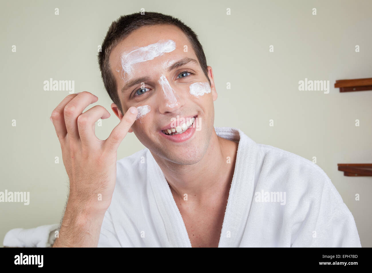 Man with cream in his face Stock Photo - Alamy
