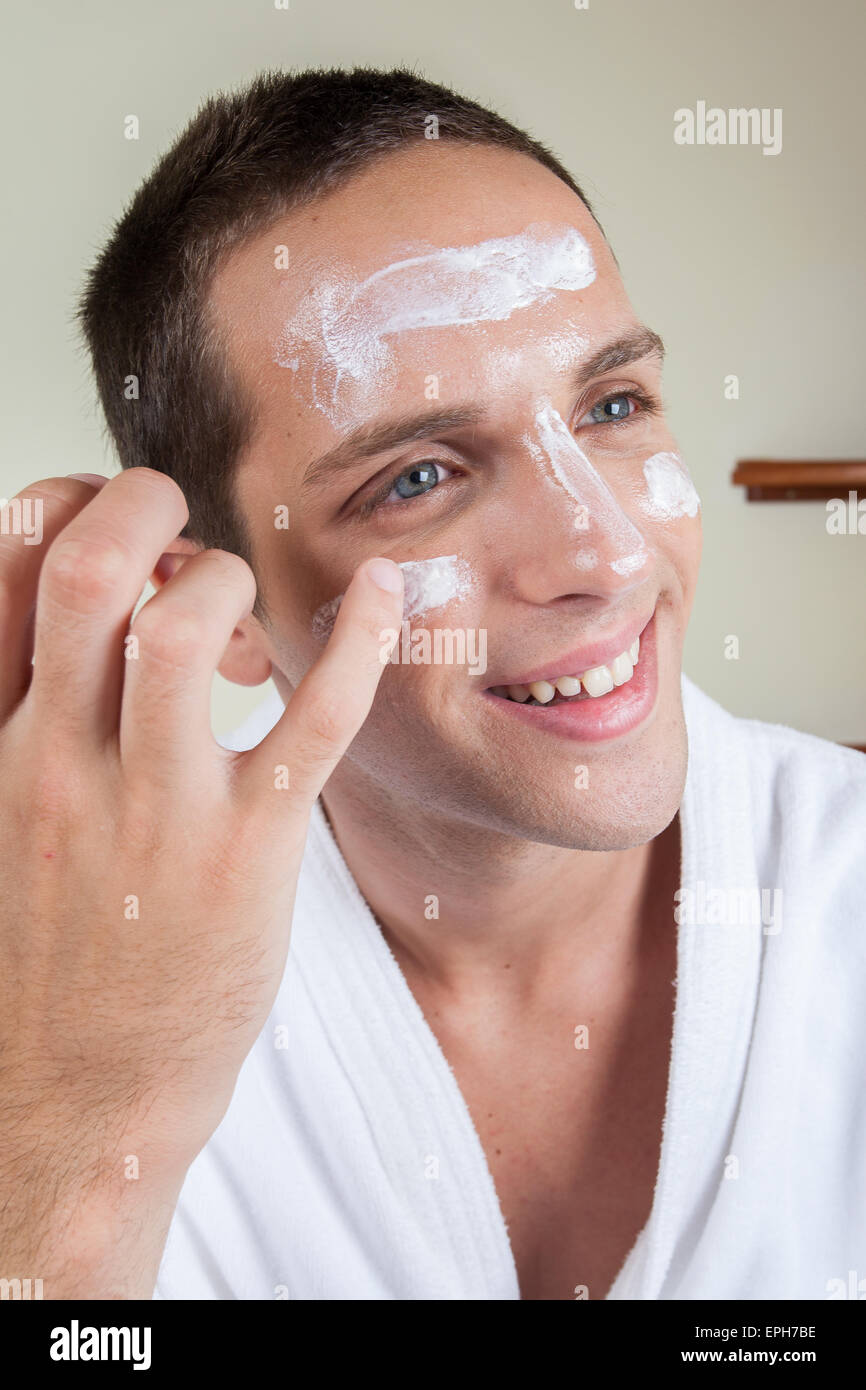 Man with cream in his face Stock Photo - Alamy