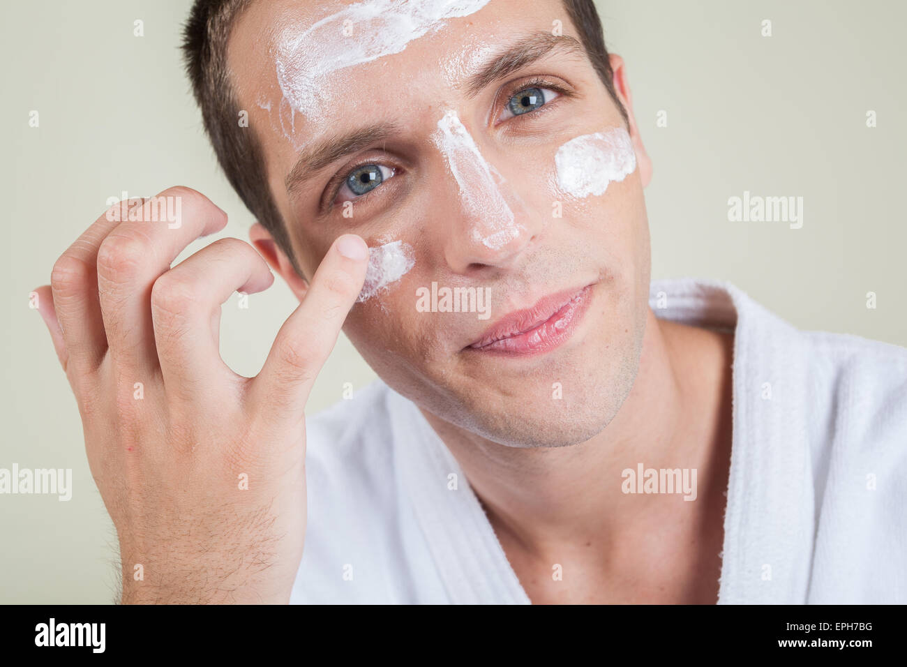 Man with cream in his face Stock Photo - Alamy