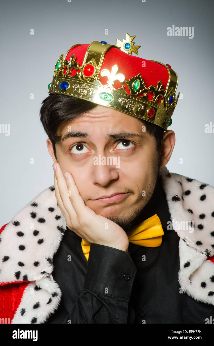 Concept with funny man wearing crown Stock Photo - Alamy