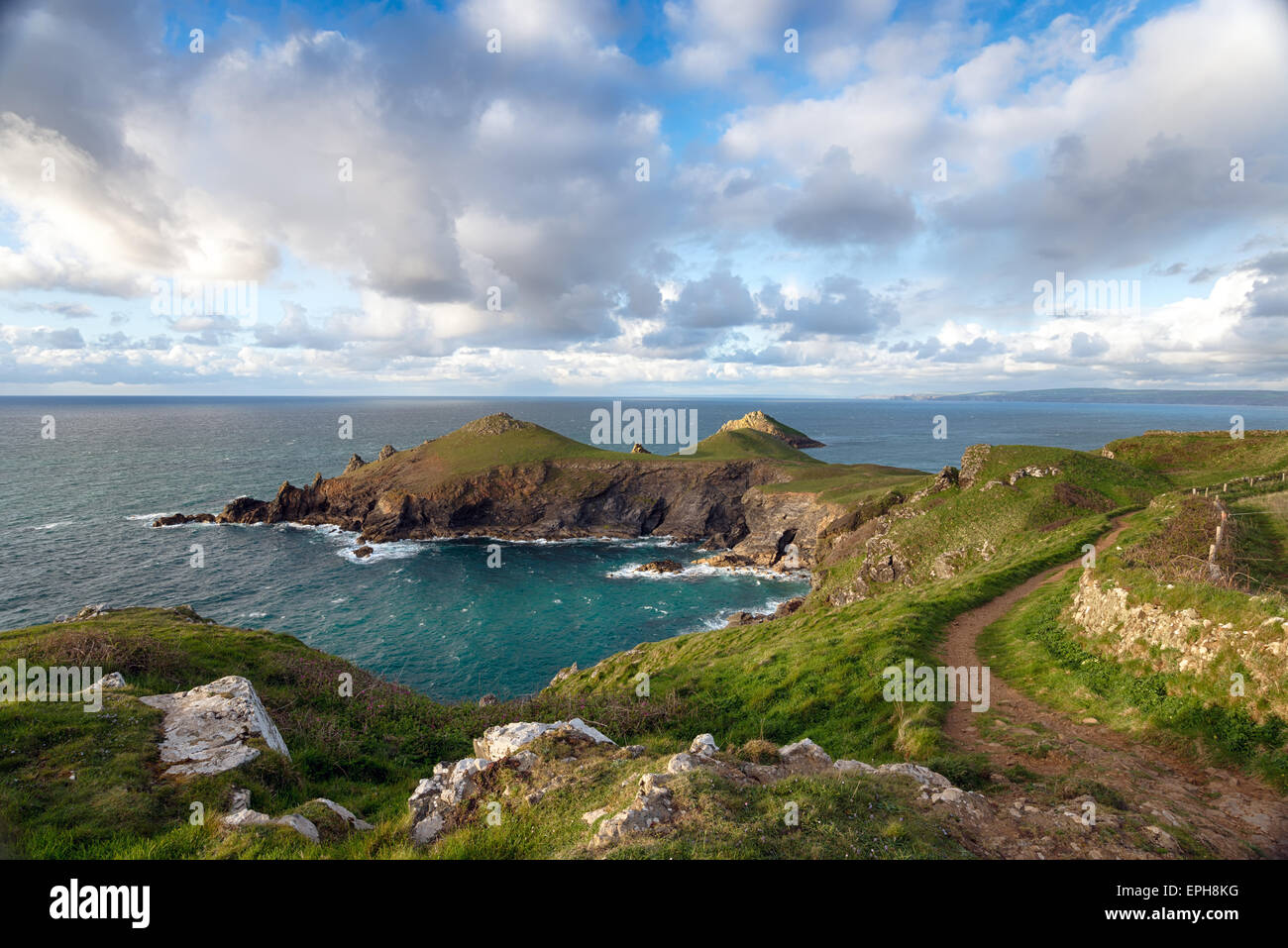 The South West Coast Path on the north Cornwall coast at The Rumps, a ...