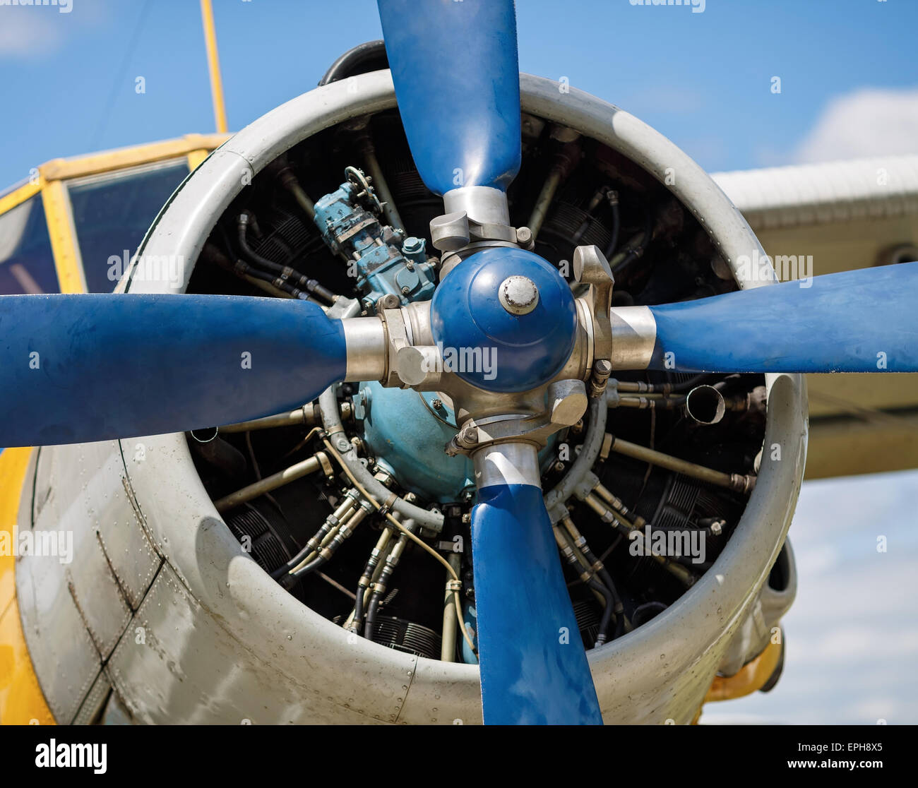 Propeller and airplane engine close-up. Shallow depth of field ...