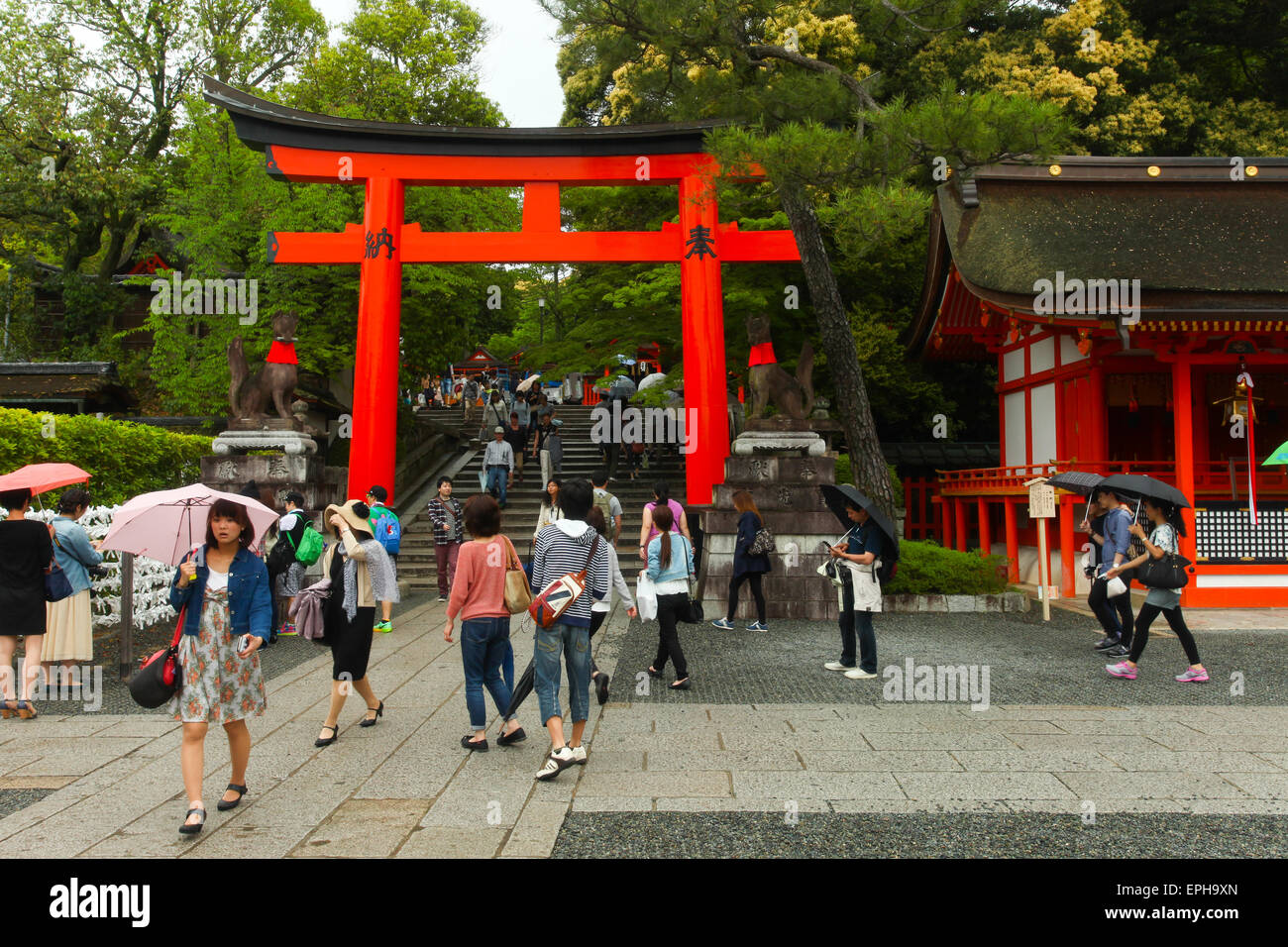 Japanese people and tourists enter Fushimi Inari Shrine in Kyoto Stock ...