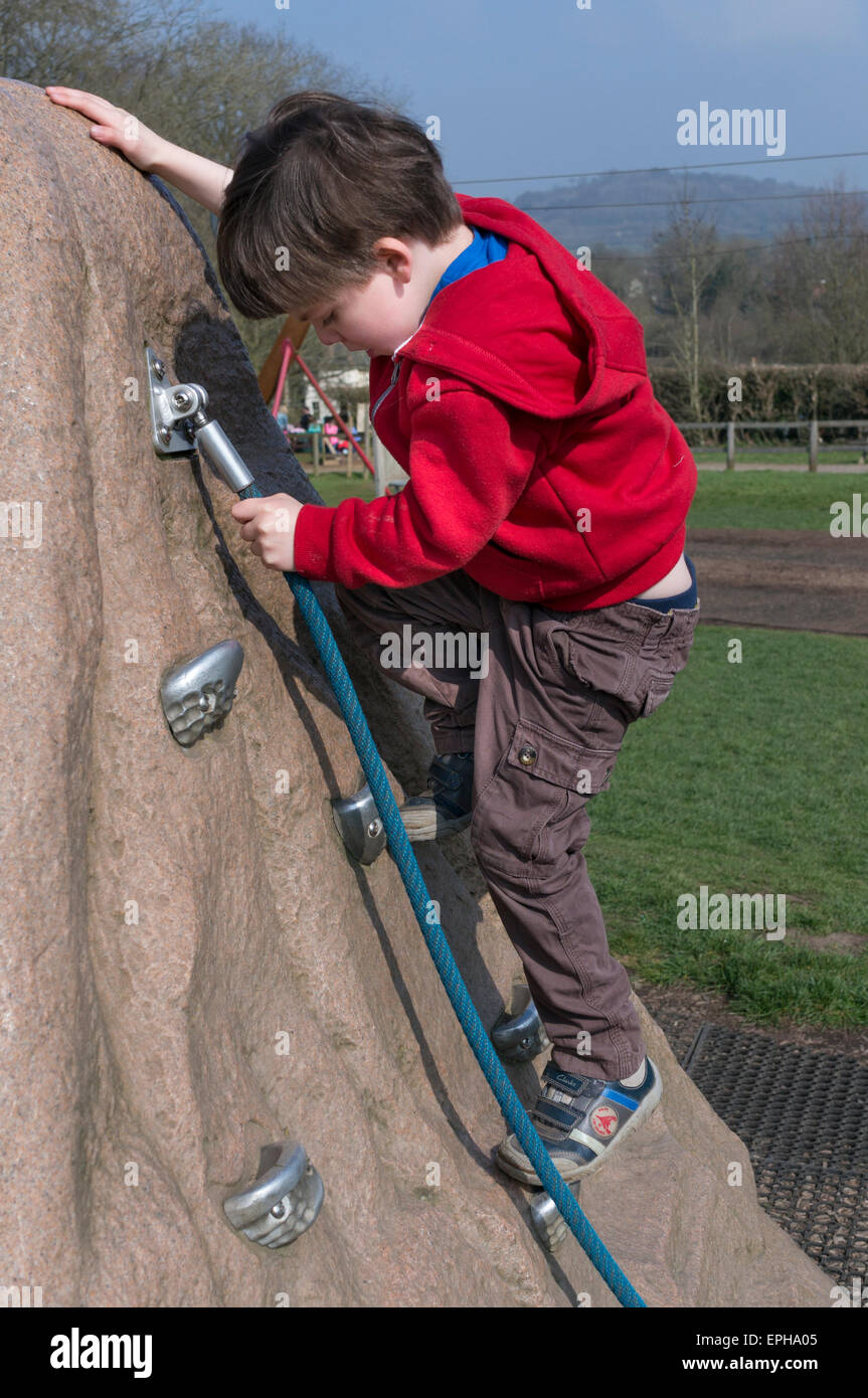 Boy climbing rock hi-res stock photography and images - Alamy