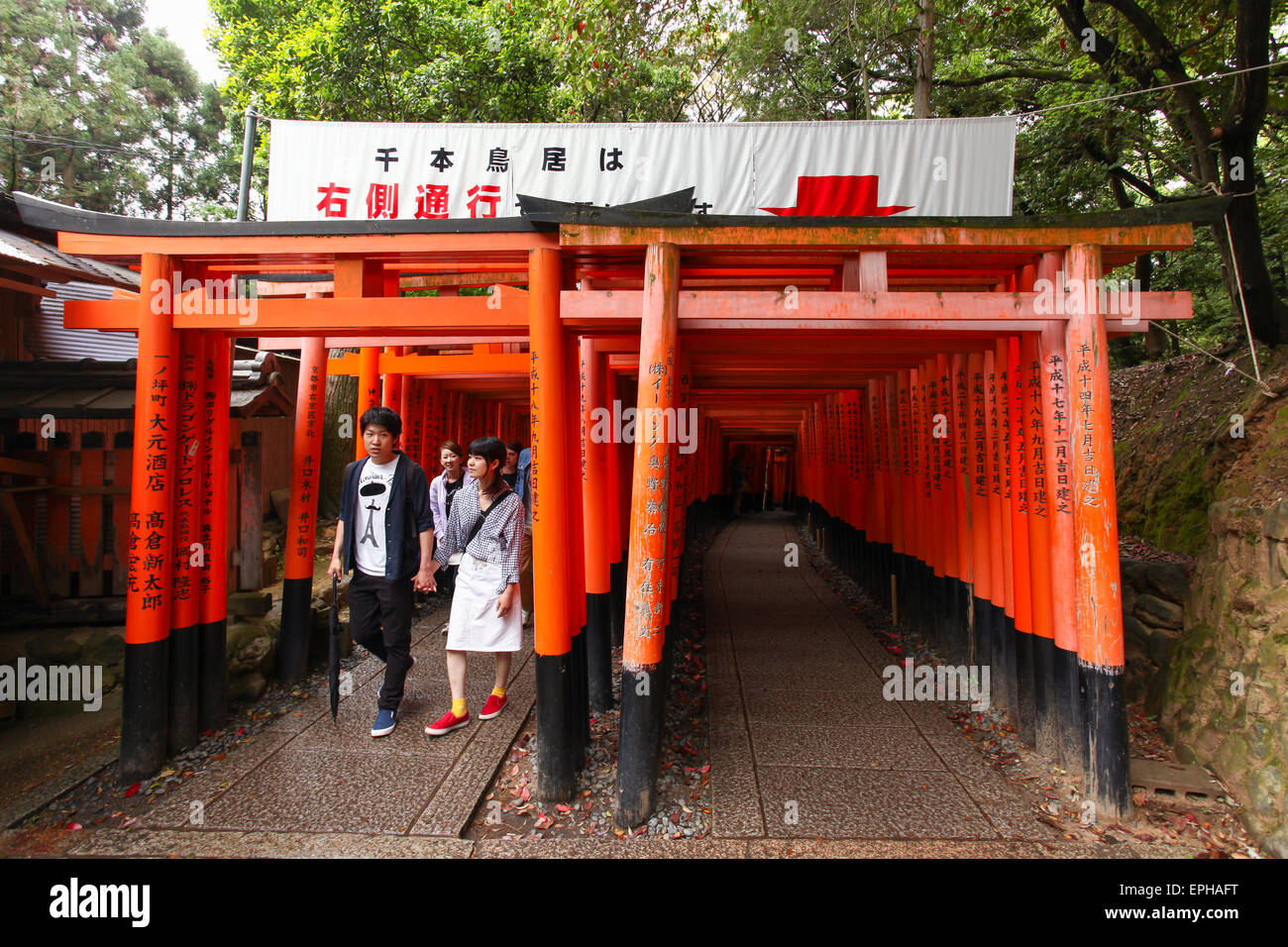 Japanese people and tourists enter Fushimi Inari Shrine in Kyoto Stock ...
