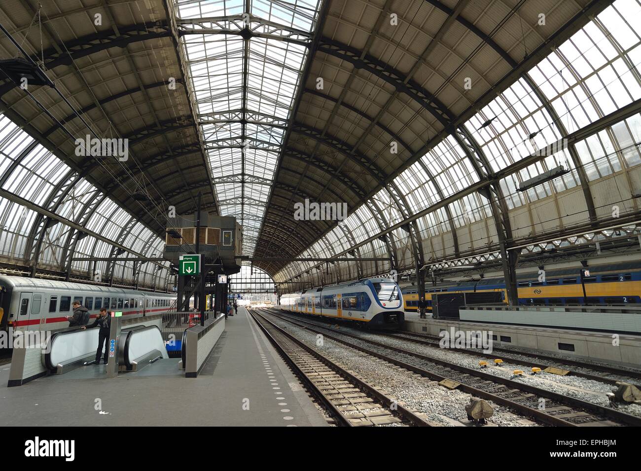 Busy with Trains inside Amsterdam Central Station Stock Photo - Alamy