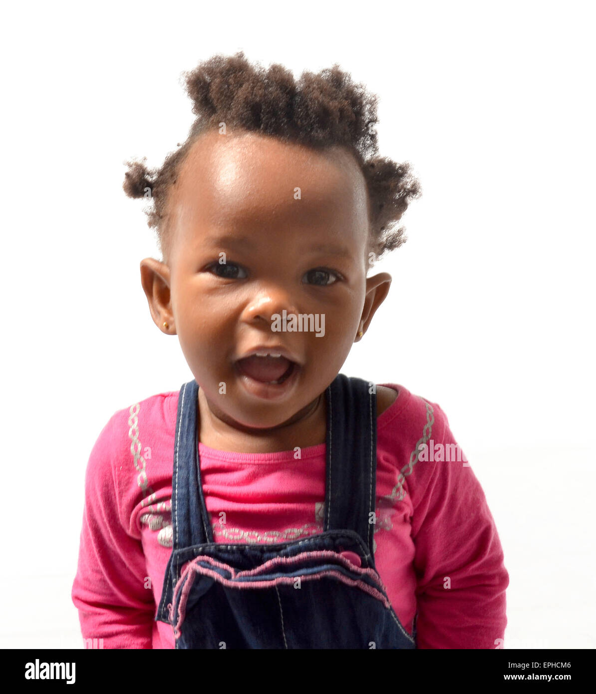 Young African baby girl having fun in photo studio Stock Photo - Alamy