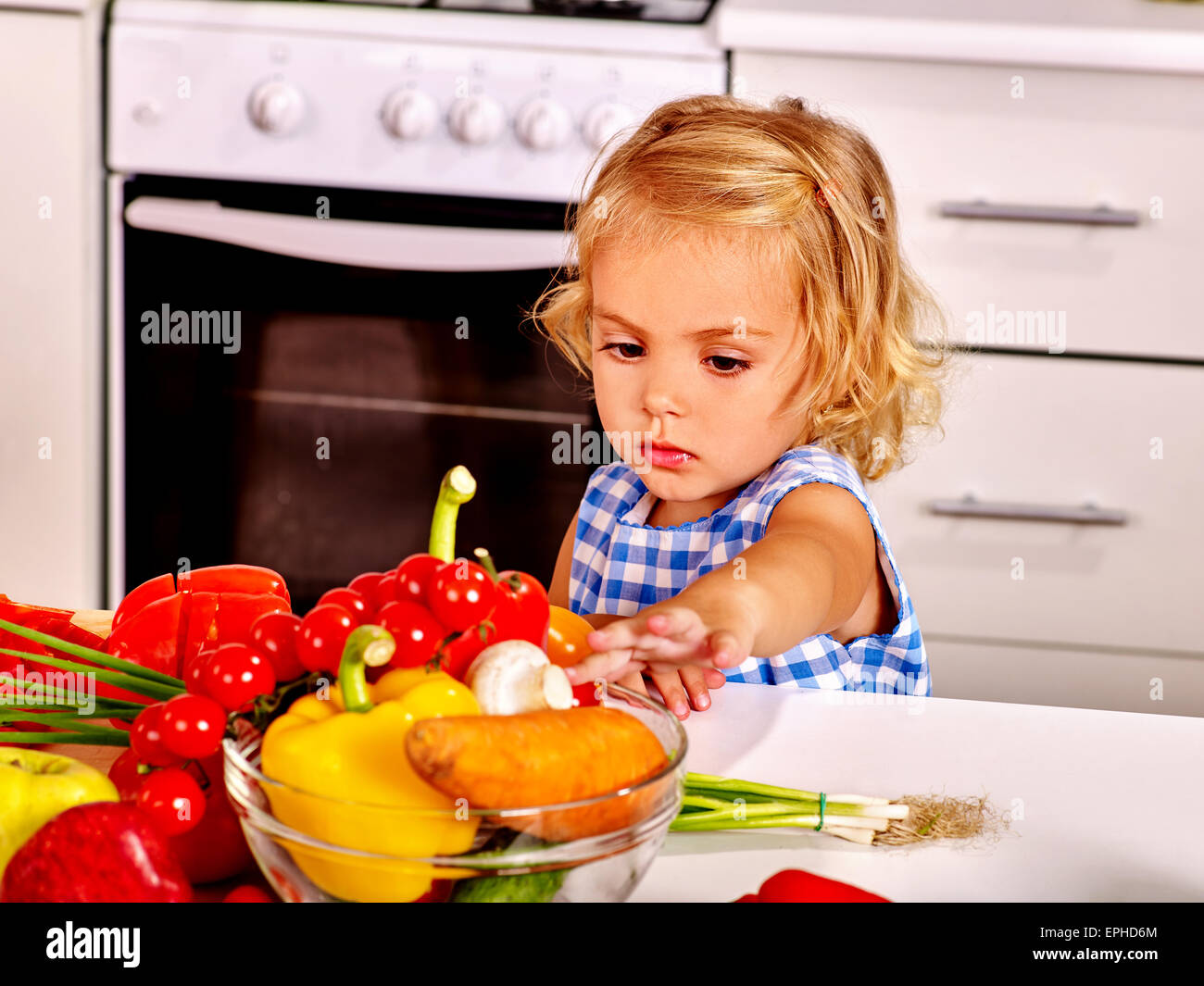Child cooking at kitchen Stock Photo - Alamy