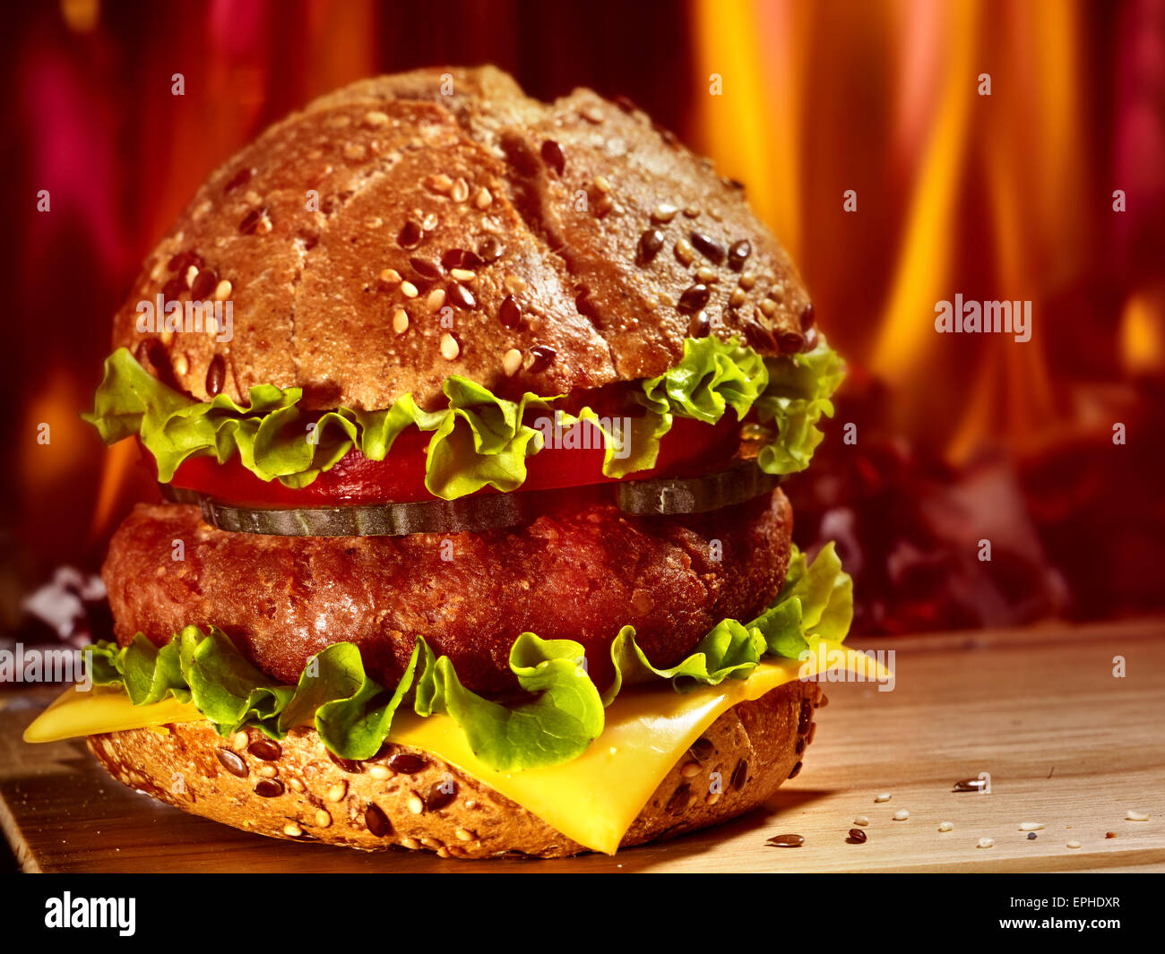 Hamburger fire flame cheeseburger hi-res stock photography and images ...