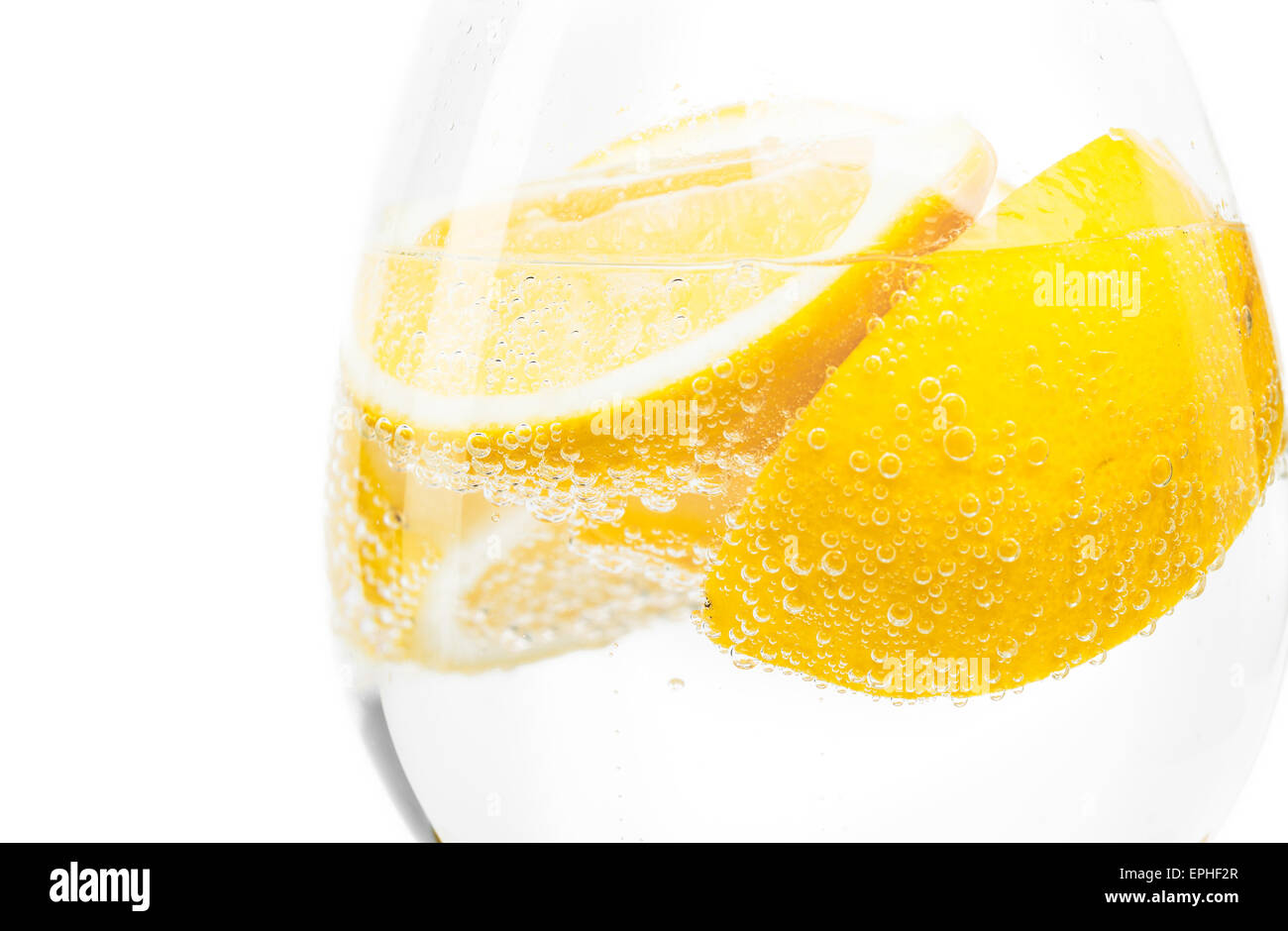 lemon in glass Stock Photo - Alamy