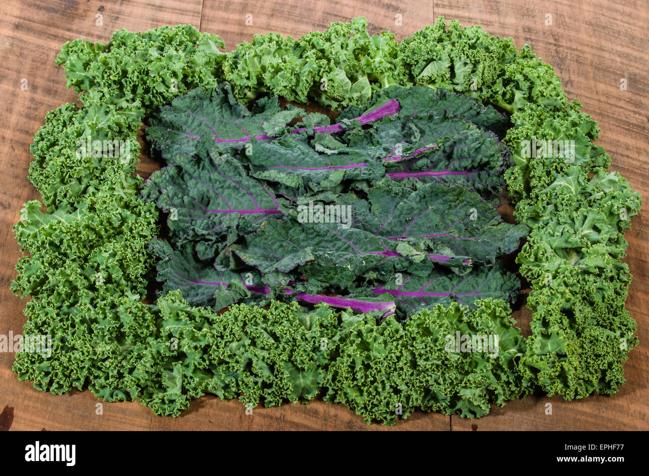 Curly and red kale leaves arranged Stock Photo - Alamy