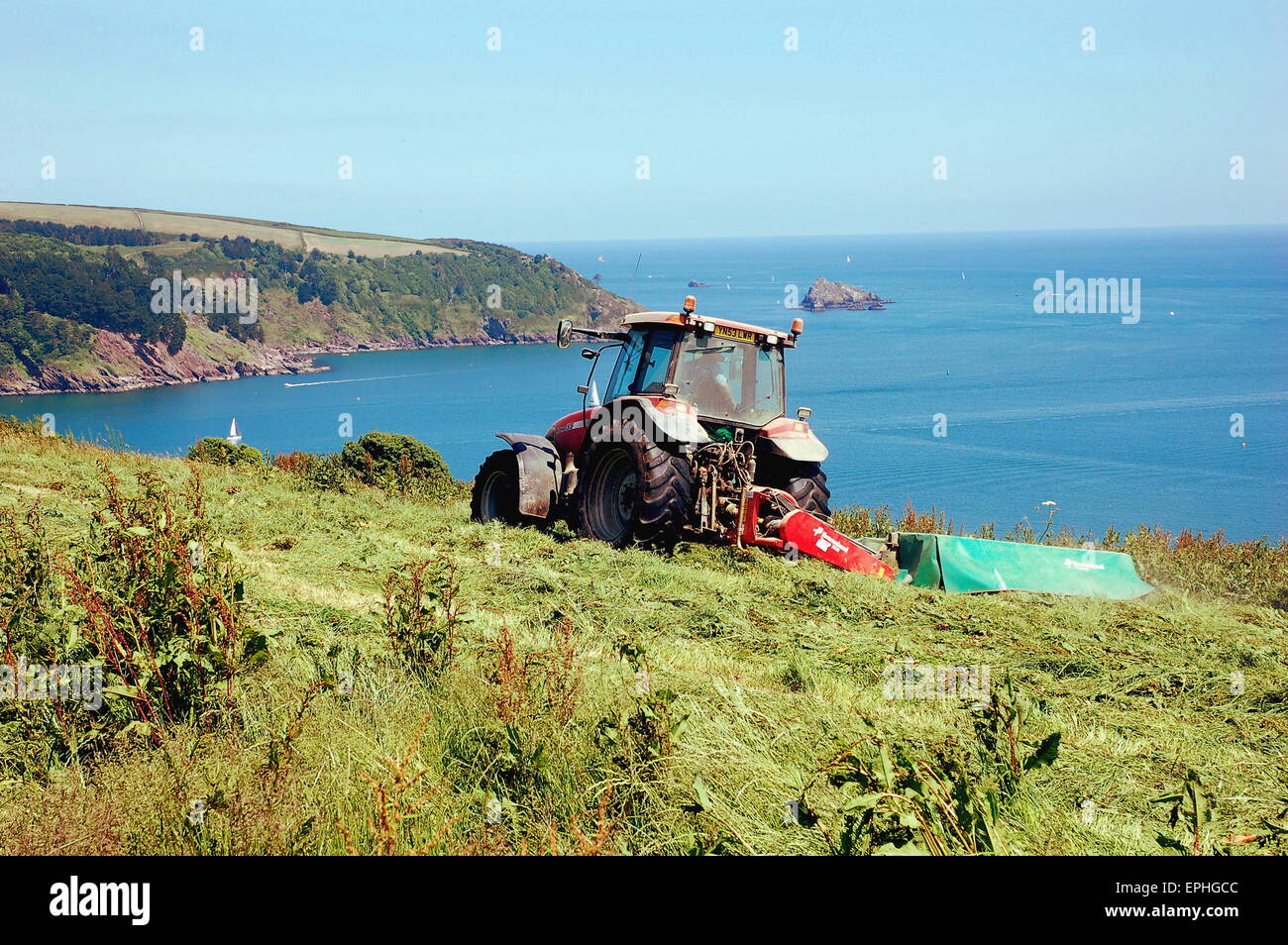 Tractor cutting grass hi-res stock photography and images - Alamy