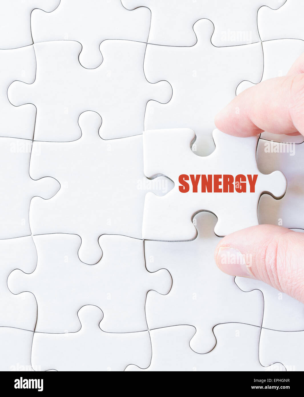 Missing jigsaw puzzle piece with word SYNERGY. Business concept image ...