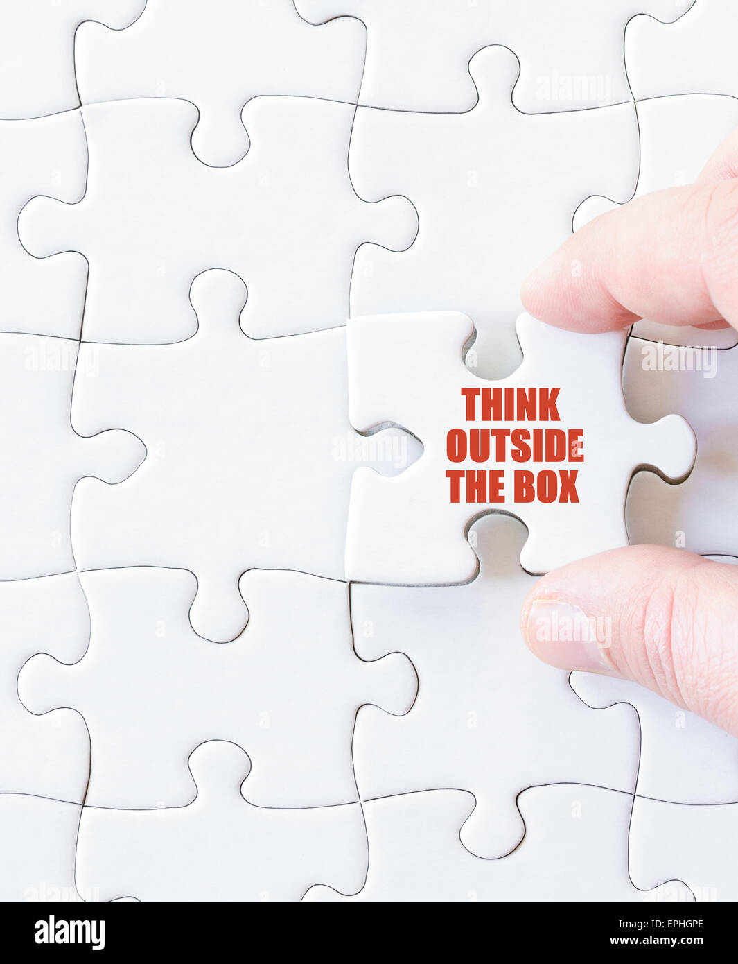 Missing jigsaw puzzle piece with word THINK OUTSIDE THE BOX. Business ...