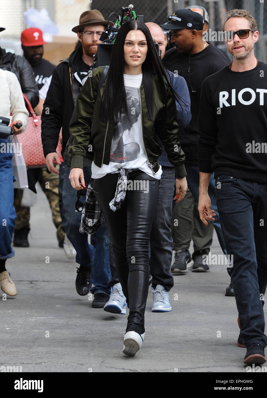 UK singer Jesse J waves at fans on a balcony while filming her latest ...