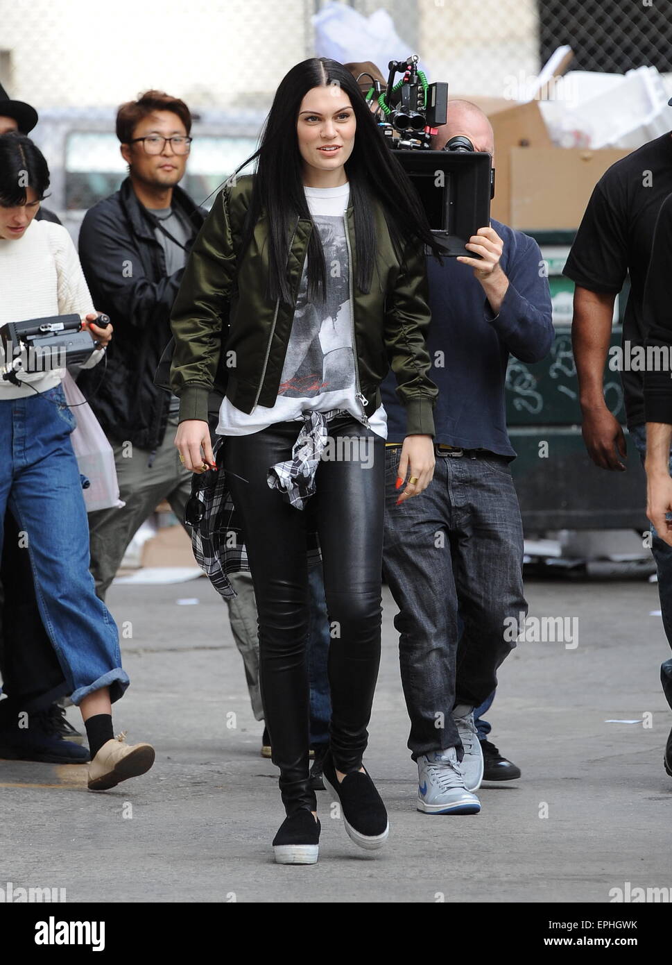 UK singer Jesse J waves at fans on a balcony while filming her latest ...