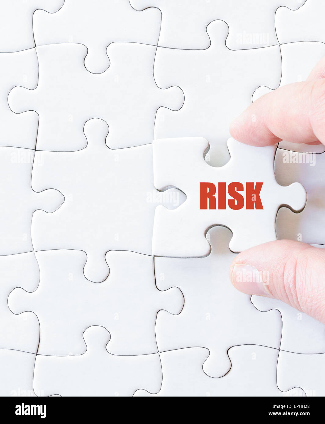 Missing jigsaw puzzle piece with word RISK. Business concept image for ...