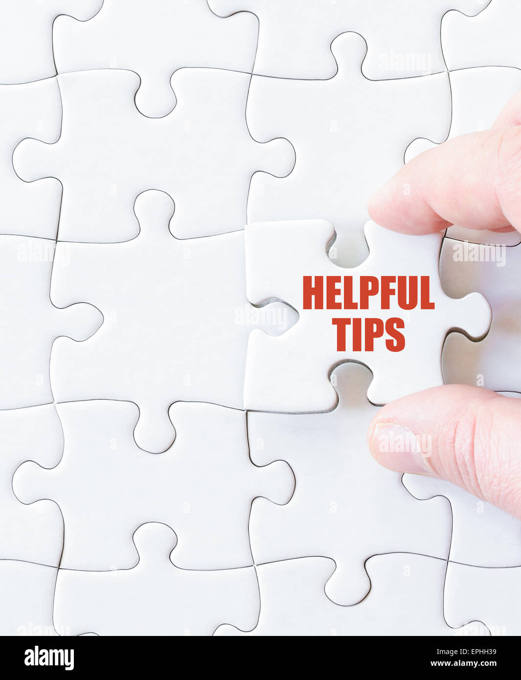 Missing jigsaw puzzle piece with words HELPFUL TIPS. Business concept ... Missing jigsaw puzzle piece with words HELPFUL TIPS. Business concept ...