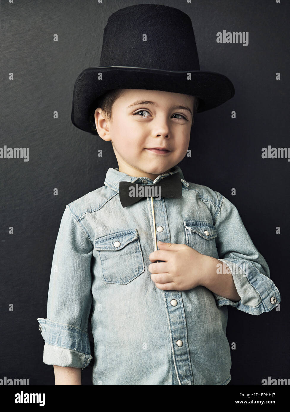Child with bow tie hi-res stock photography and images - Alamy