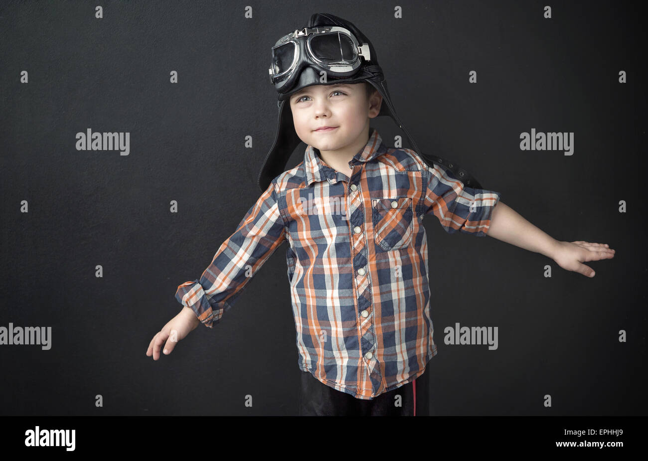 Portrait of a little cute pilot Stock Photo - Alamy