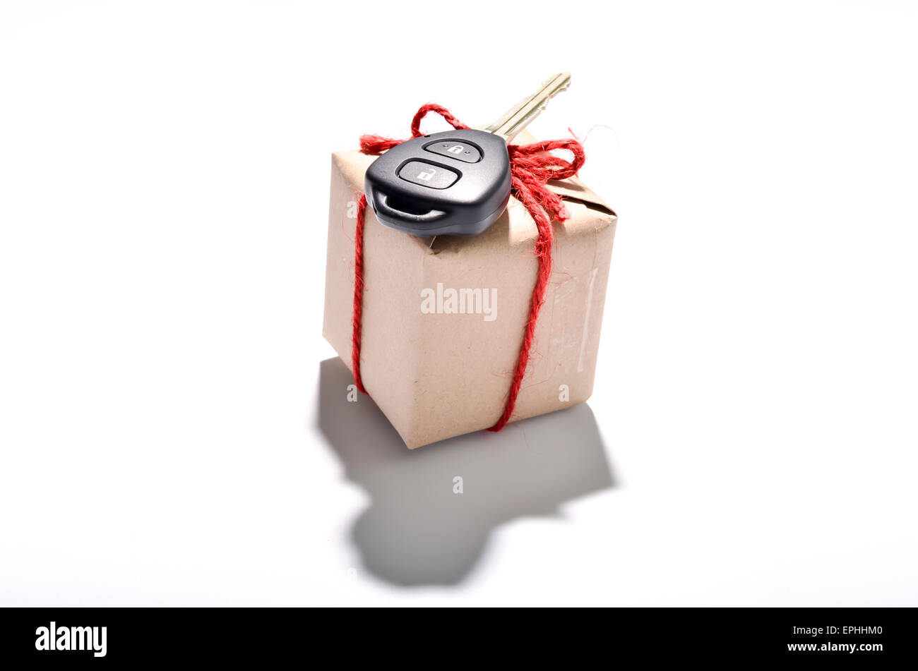 car key and gift box isolated on white background Stock Photo - Alamy