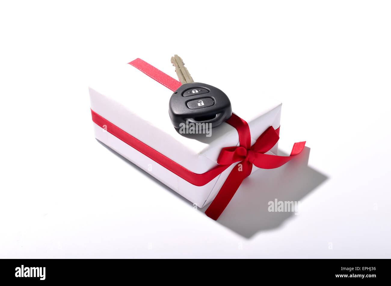 car key and gift box isolated on white background Stock Photo - Alamy