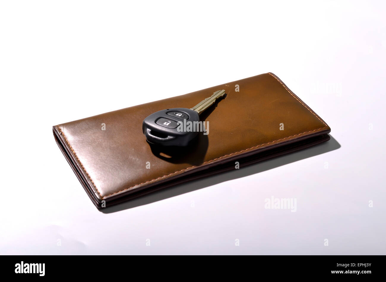 car key with wallet isolated on white background Stock Photo - Alamy