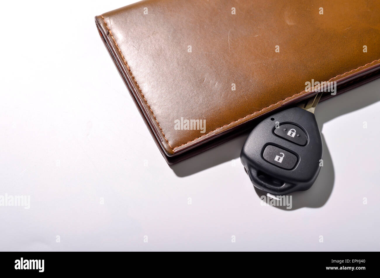 car key with wallet isolated on white background Stock Photo - Alamy