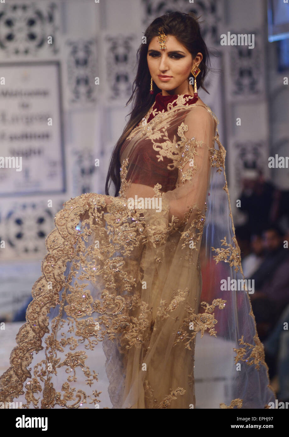 Lahore, Pakistan. 18th May, 2015. Pakistani model presents a summer ...