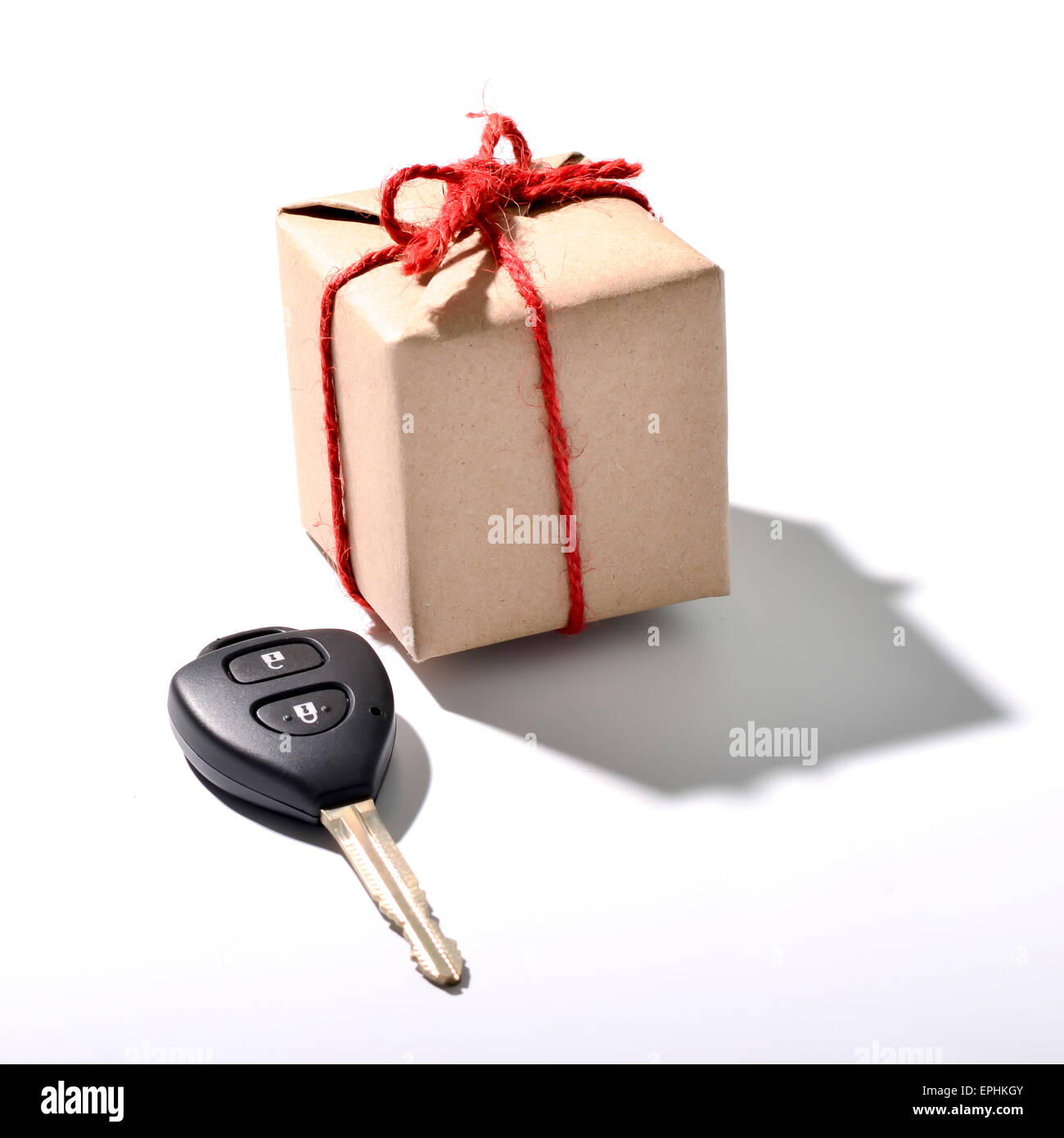 car key and gift box isolated on white background Stock Photo - Alamy