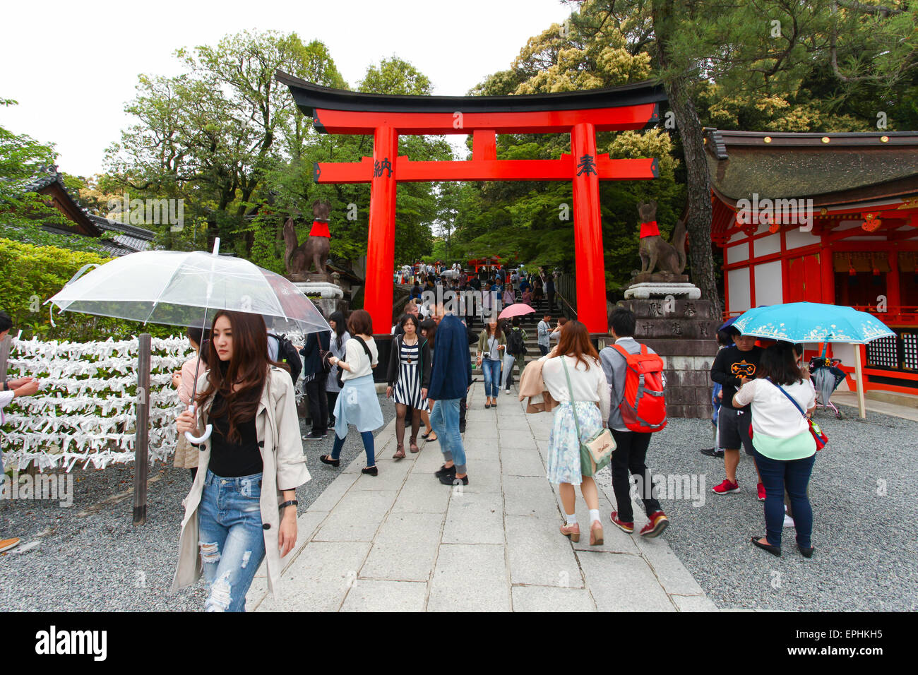 Japanese people and tourists enter Fushimi Inari Shrine in Kyoto Stock ...