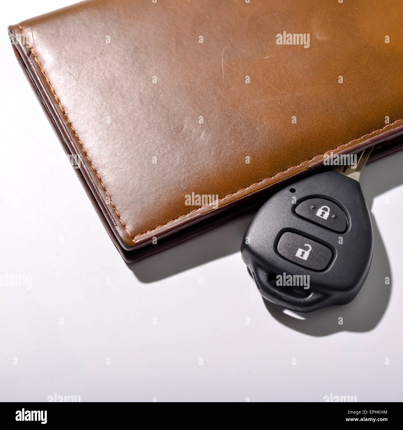 car key with wallet isolated on white background Stock Photo - Alamy