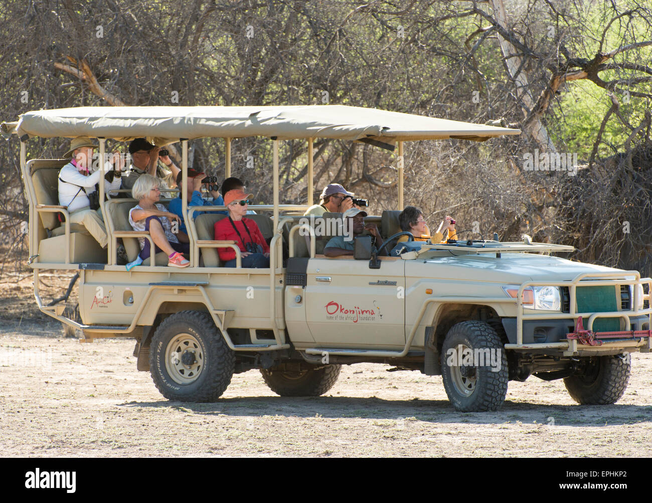Africa, Namibia. AfriCat Foundation. Tourists sightseeing Stock Photo ...