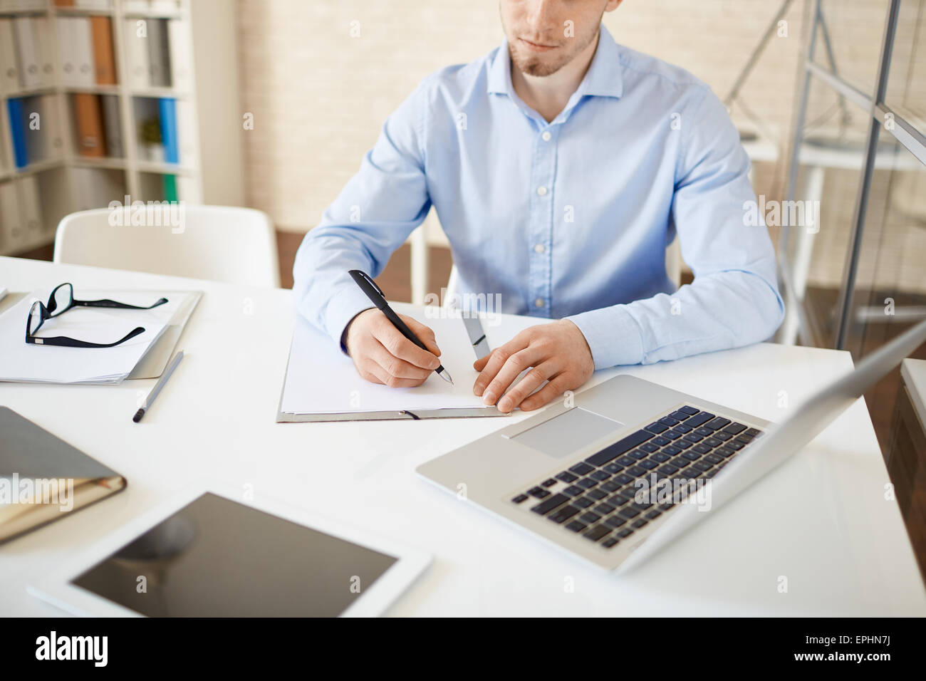 Man writing down hi-res stock photography and images - Alamy