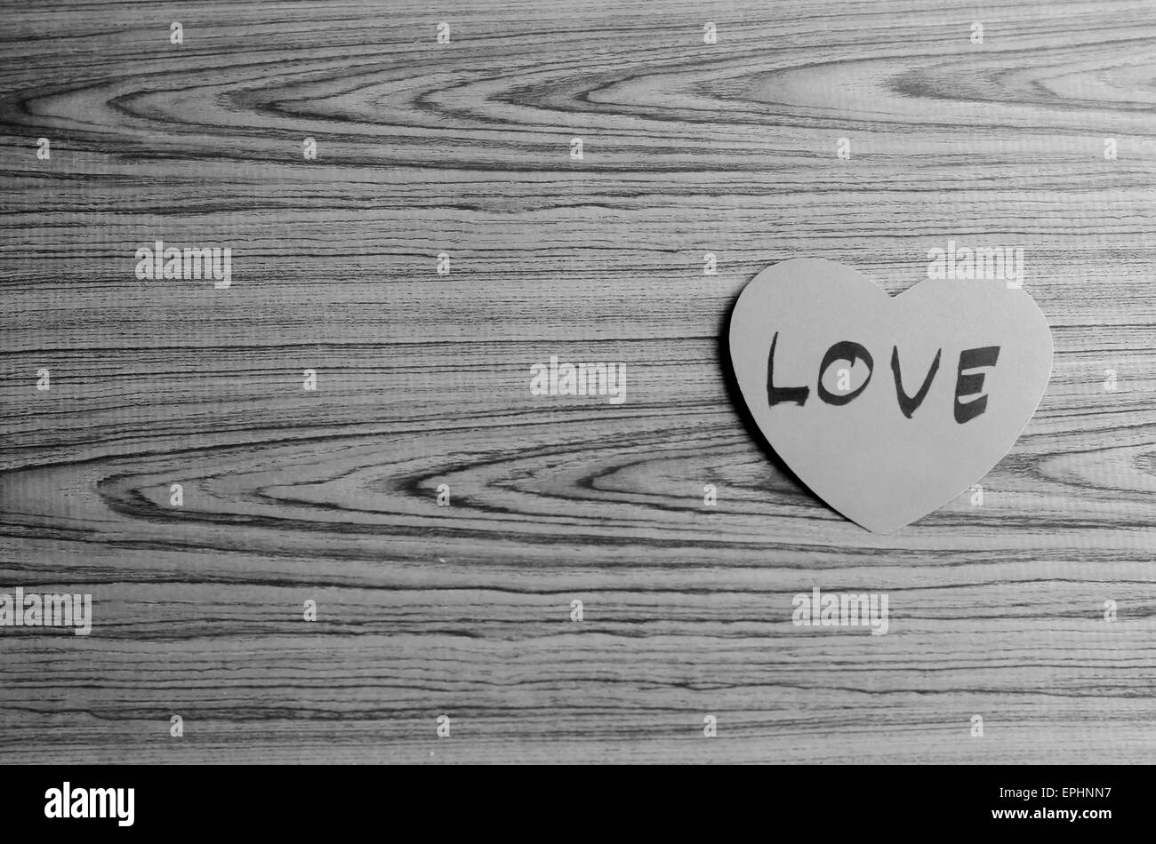 black and white paper heart write love word Stock Photo - Alamy