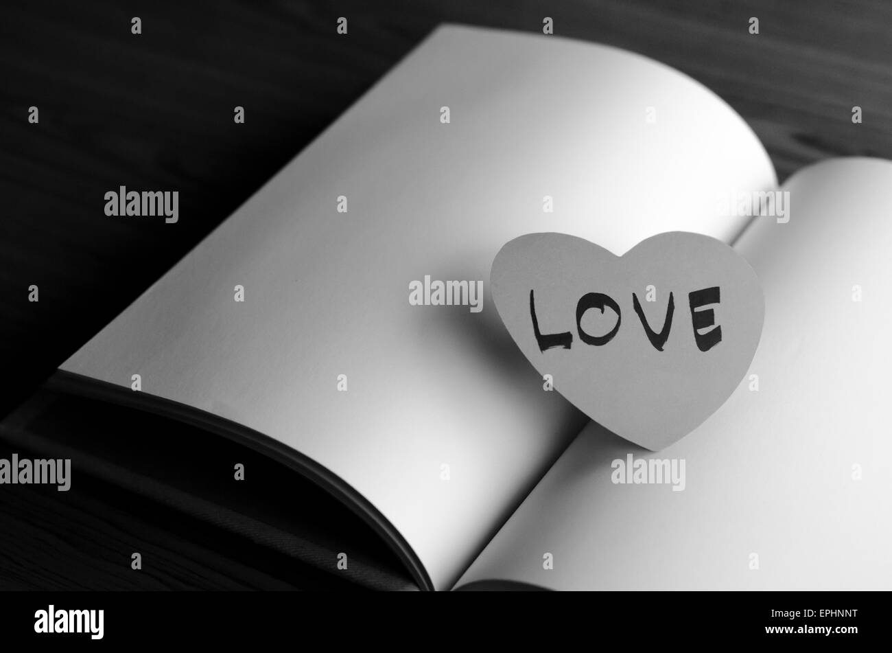 black and white paper heart write love word word Stock Photo - Alamy